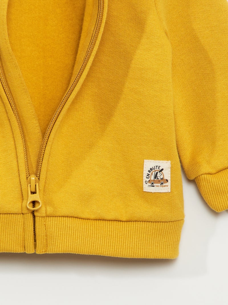 Felpa con zip in tessuto felpato - giallo - Kiabi - 9.00€ Felpa con zip in tessuto felpato - giallo - Kiabi - 9.00€
