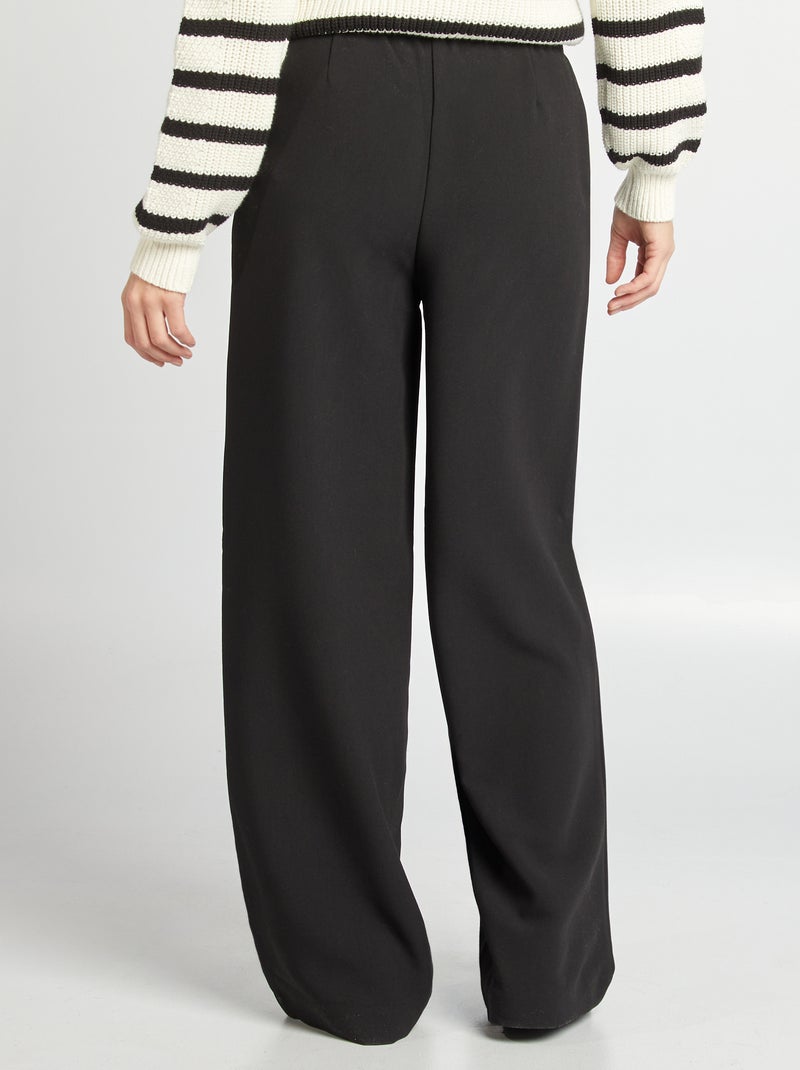 Pantaloni larghi con vita elasticizzata e cordoncini da stringere ...